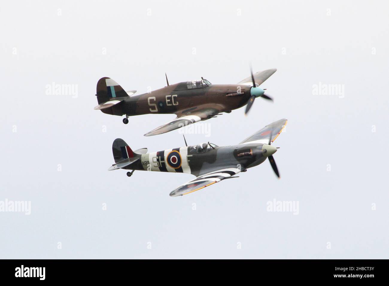 A Spitfire Vb (AB910) and a Hurricane IIc (PZ865) from the Royal Air ...