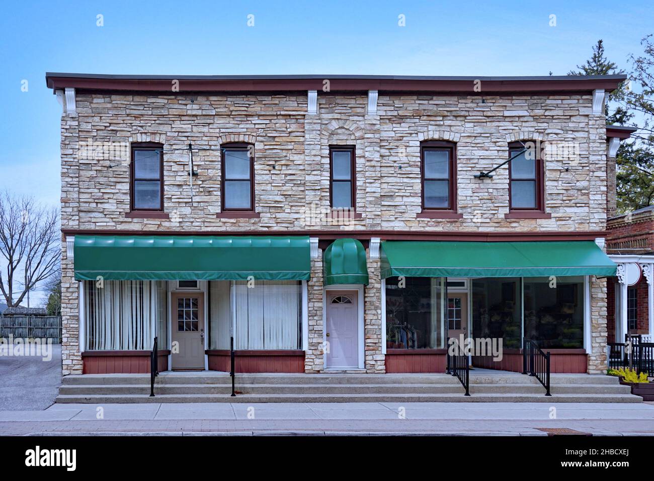 Small building with stores on ground floor and apartments above Stock ...