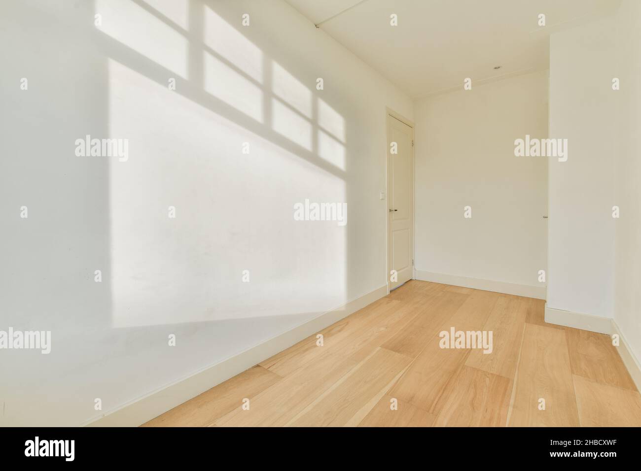 Interior of new apartment, empty living room, wooden floor Stock Photo ...