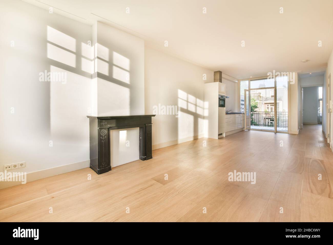 Interior of new apartment, empty living room, wooden floor Stock Photo ...
