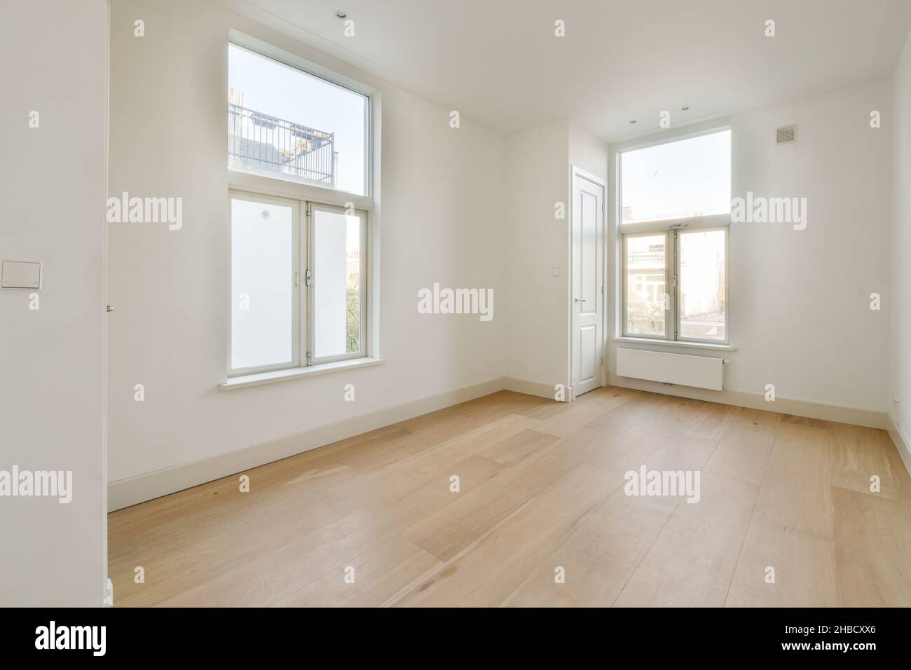 Interior of new apartment, empty living room, wooden floor Stock Photo ...