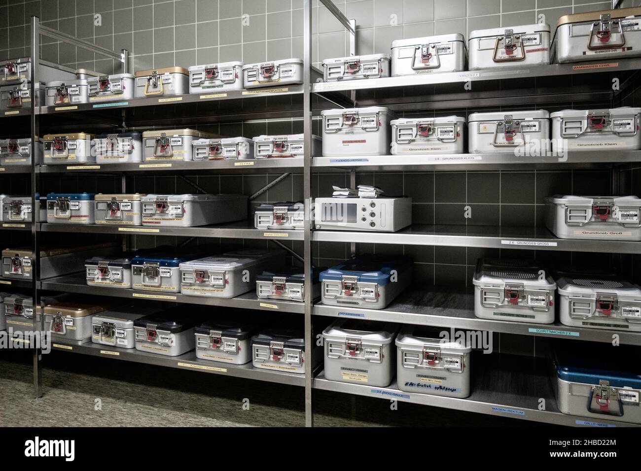 in a sterile goods store there are instrument containers with sterile ...