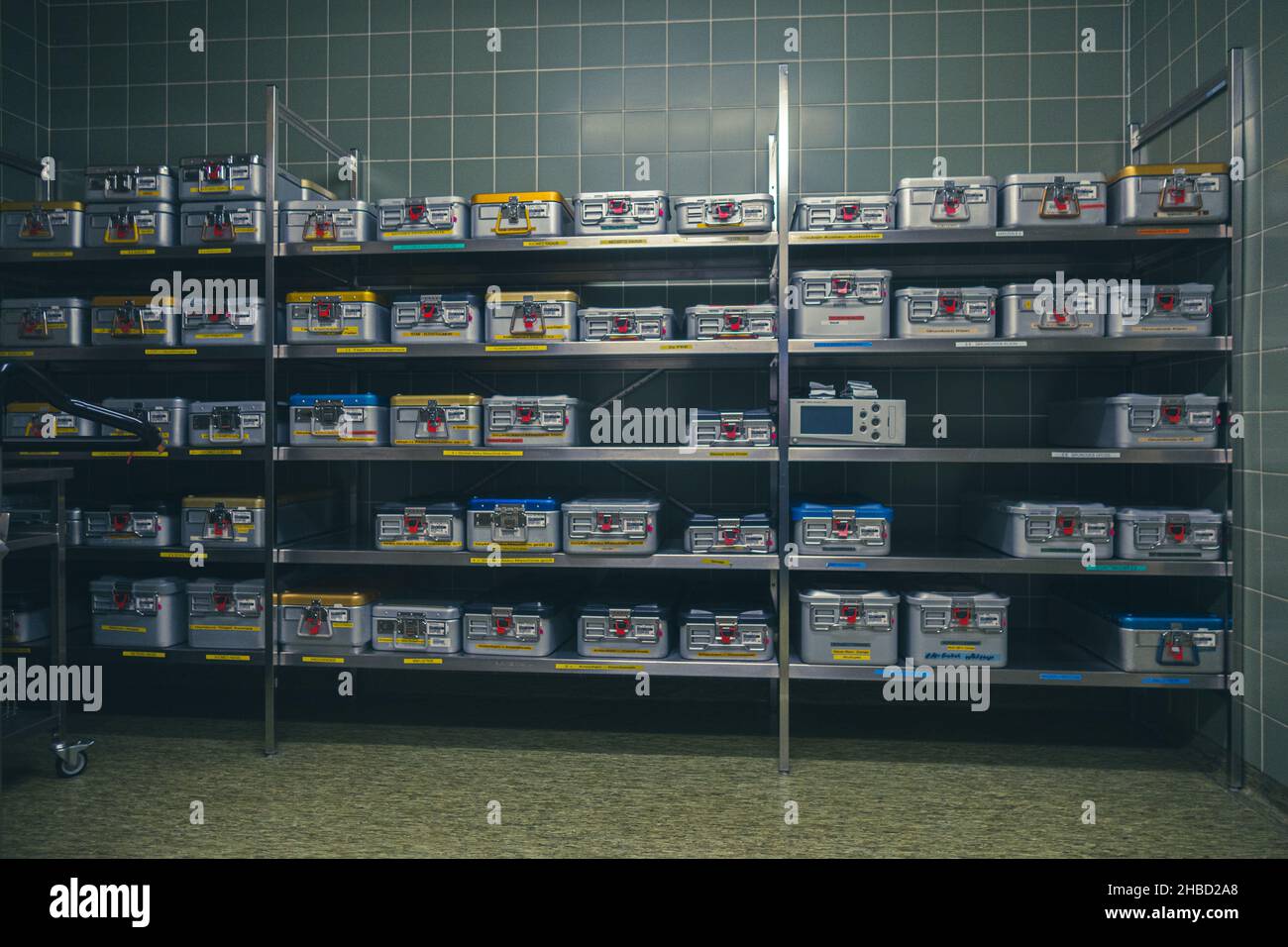 in a sterile goods store there are instrument containers with sterile ...