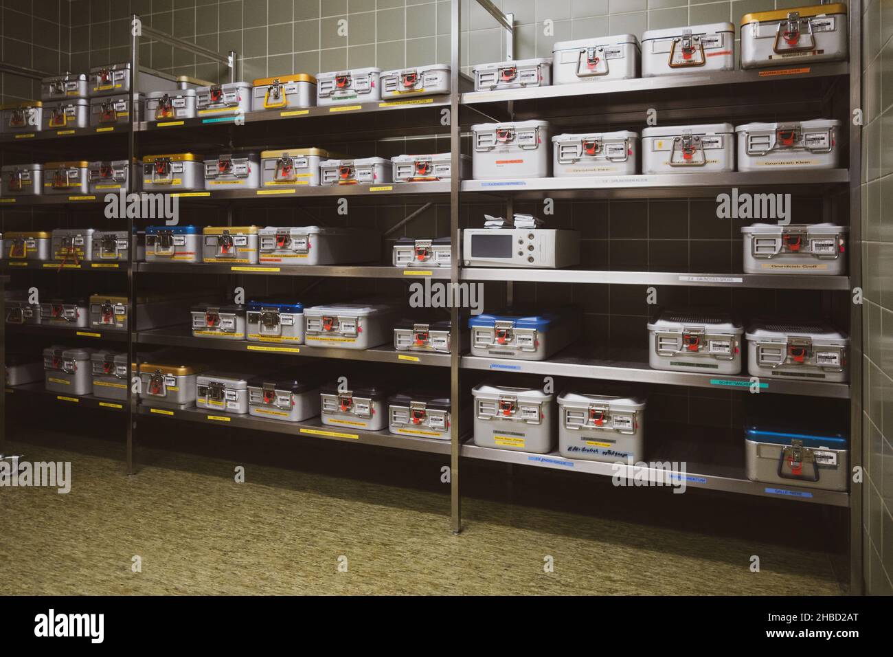 in a sterile goods store there are instrument containers with sterile ...