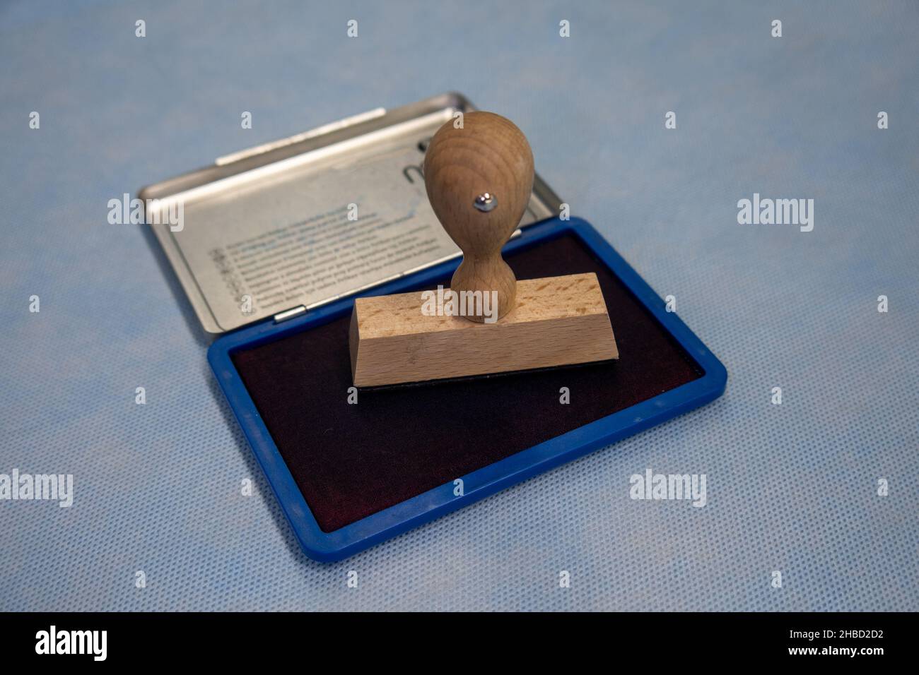 a document stamp stands on an ink pad Stock Photo - Alamy