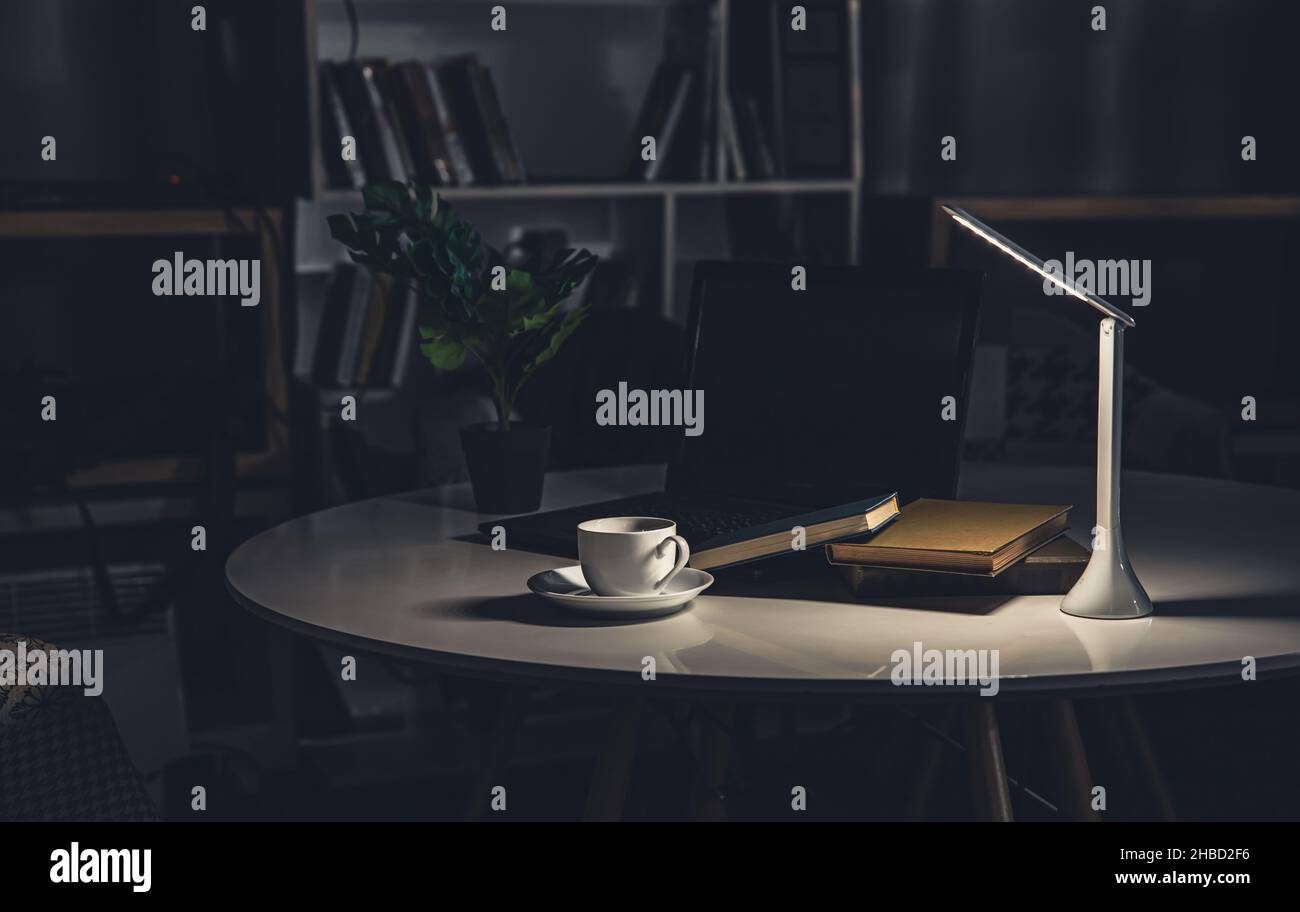 Workplace late at night, night work concept Stock Photo - Alamy