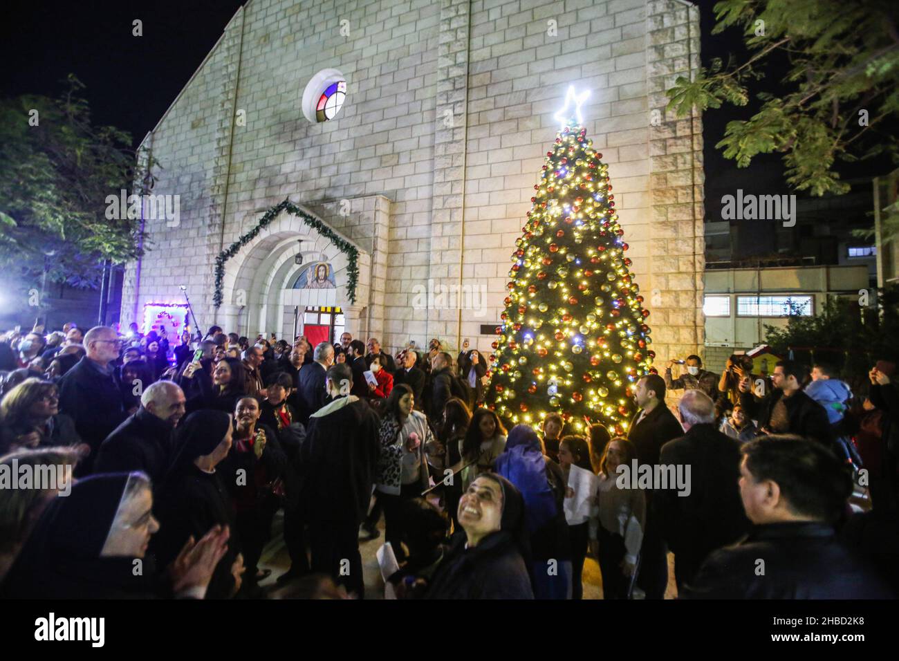 Gaza, Palestine. 18th Dec, 2021. A crowd of Palestinian Christians ...