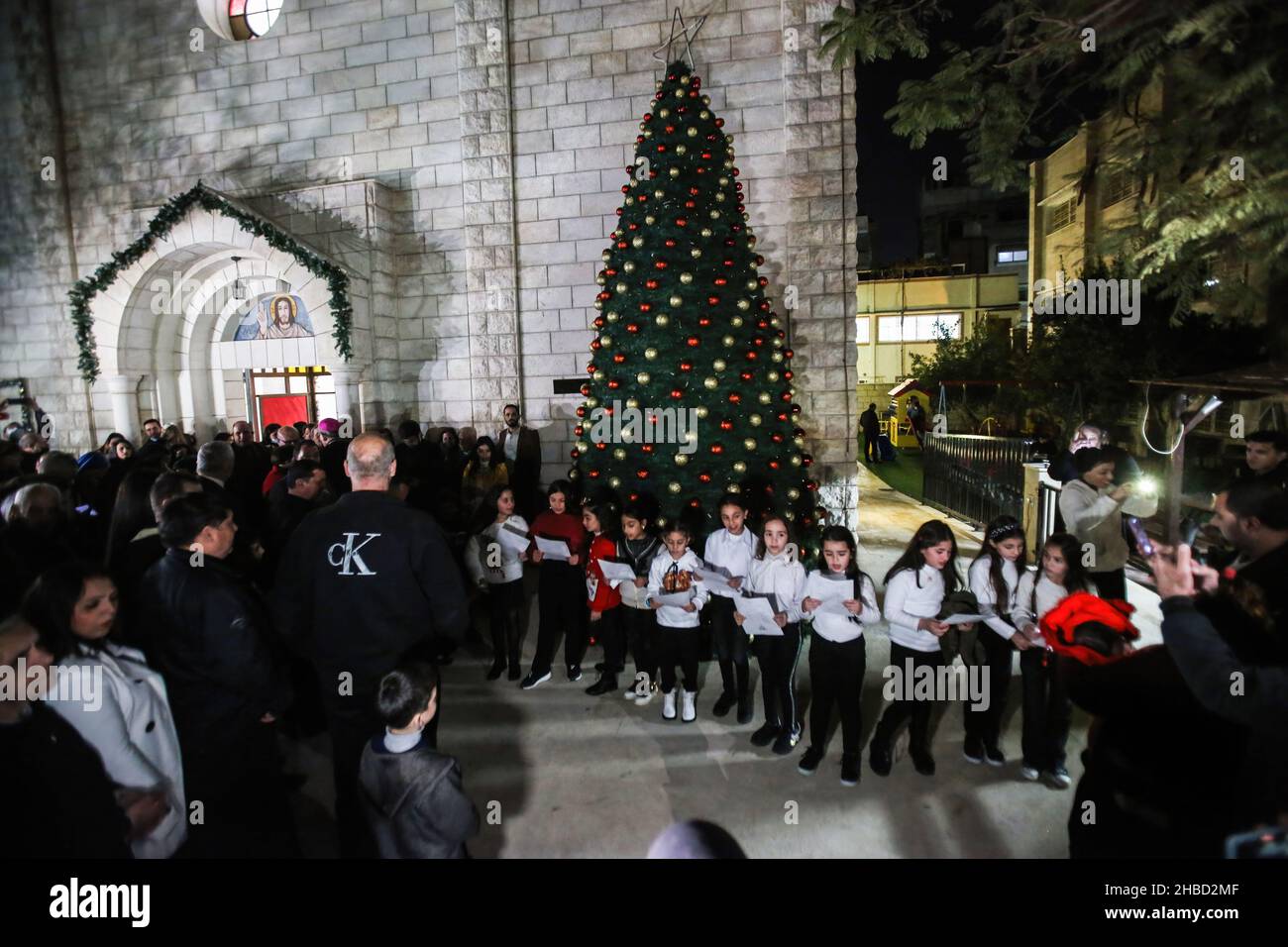 Gaza, Palestine. 18th Dec, 2021. A crowd of Palestinian Christians ...