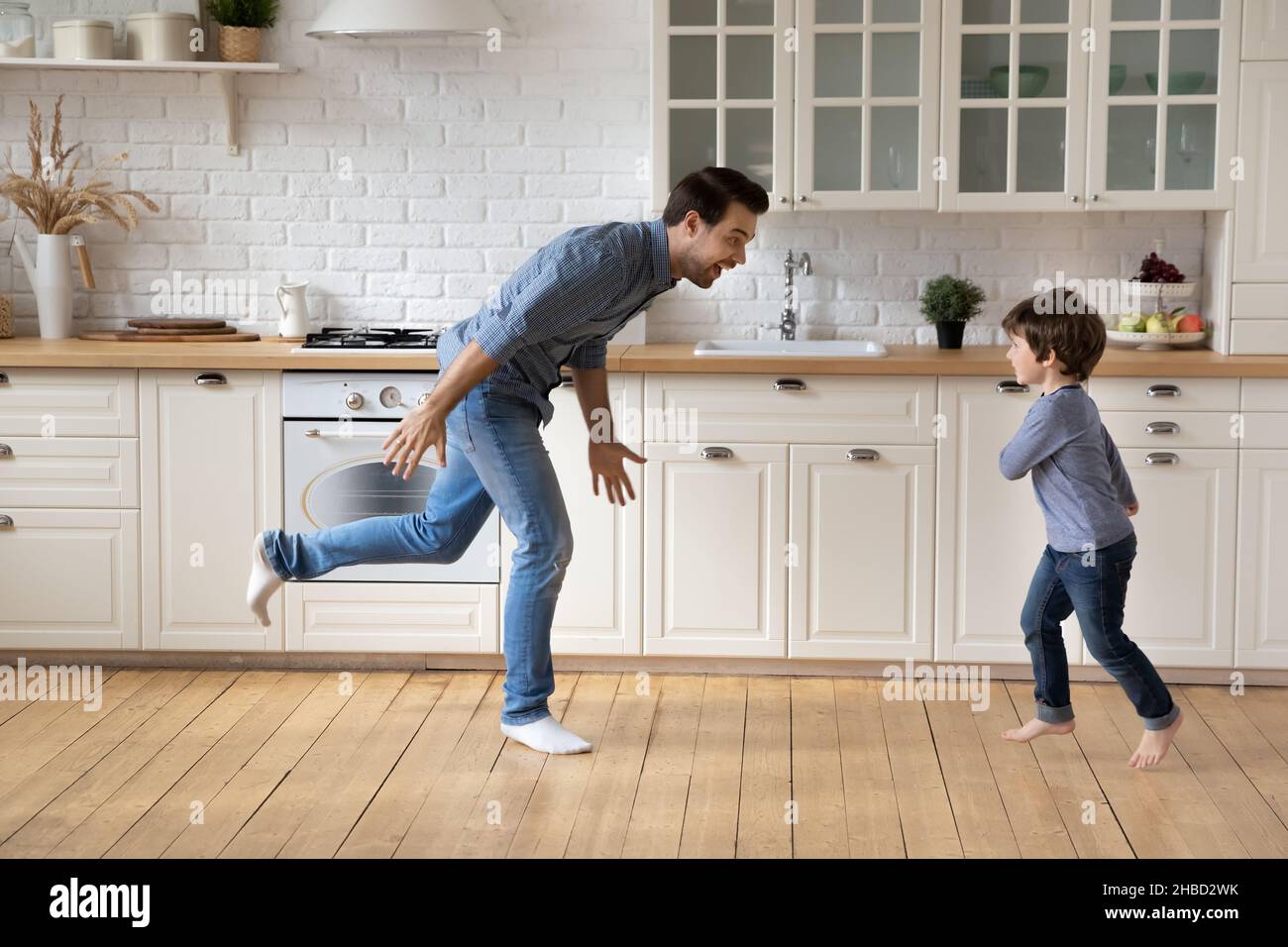 Family in kitchen movement hi-res stock photography and images - Alamy