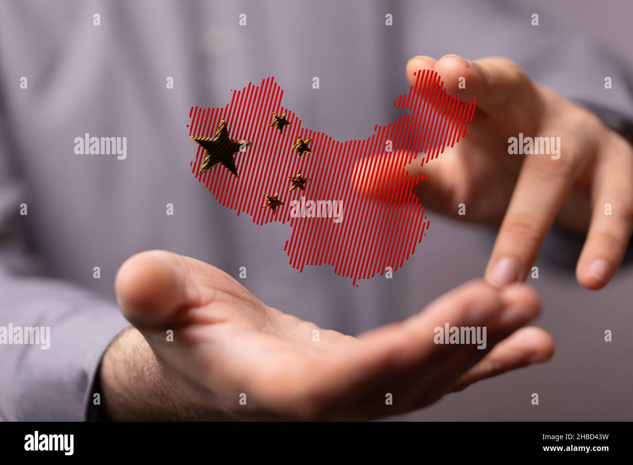 A 3D rendering of the map of the People's Republic of China in a person ...