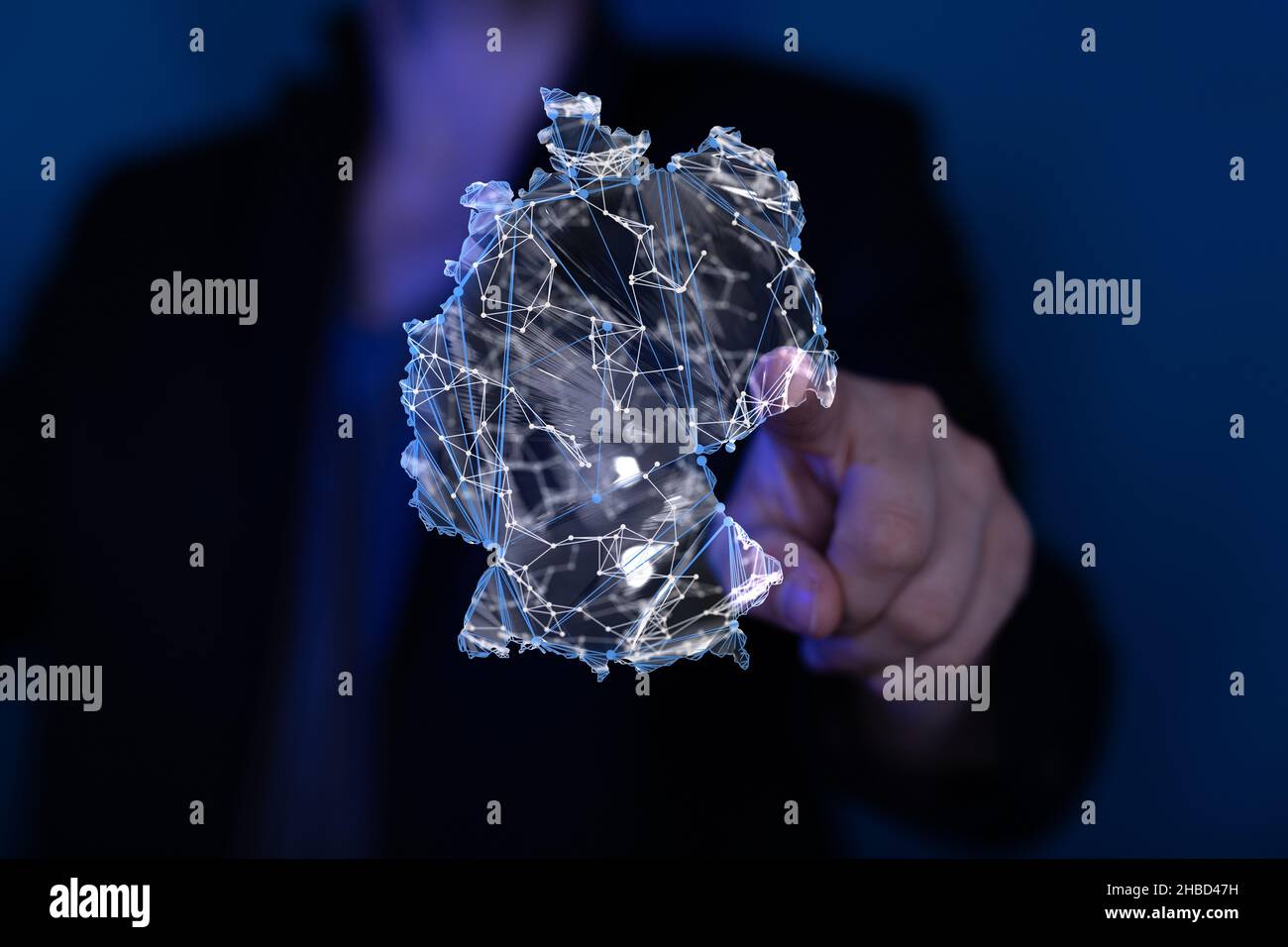 A person touching the 3D rendering of the digital map of Germany Stock ...