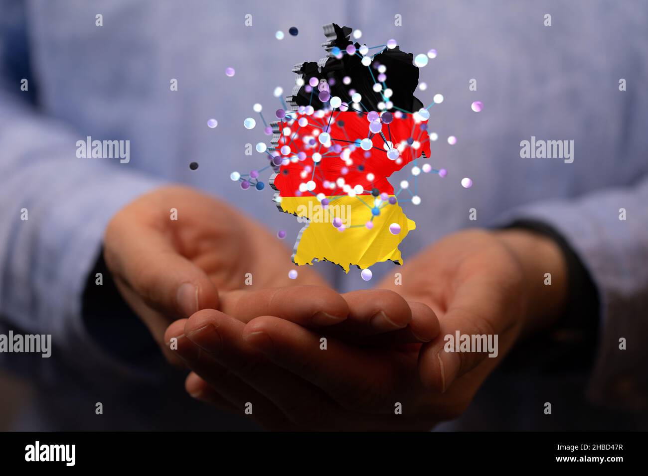 A 3D rendering of the digital map of Germany in a person's hands Stock ...