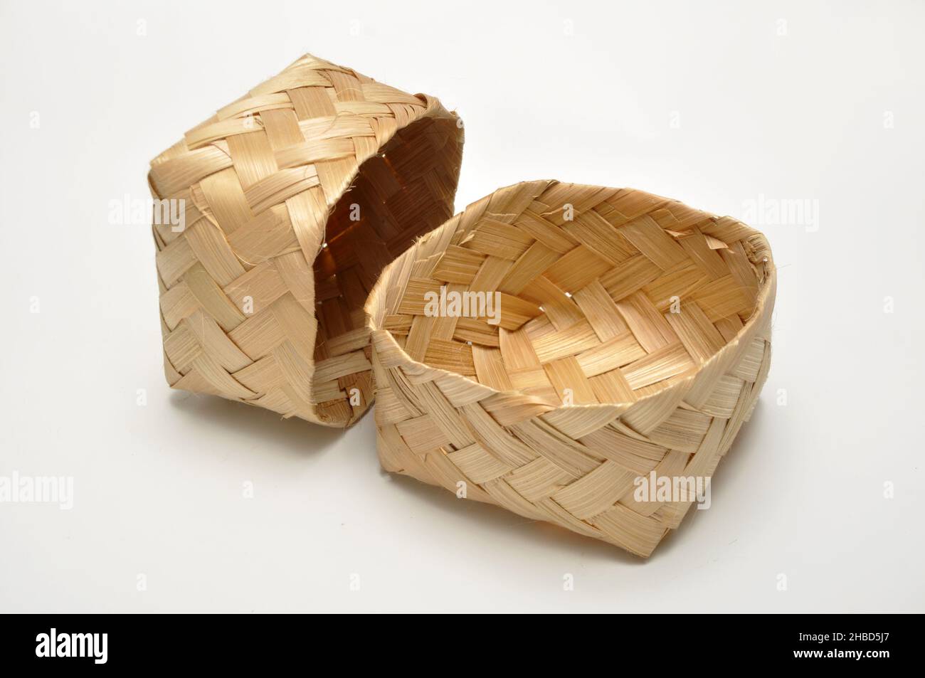 Traditional containers made of bamboo white background studio shoot ...