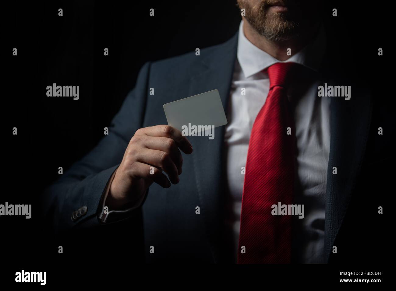 Businessman holding credit card. Hand holding blank credit card mockup ...