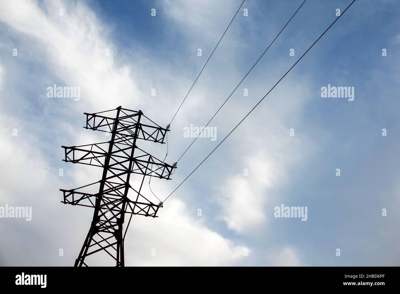 Electricity transmission pylon view against the sky during sunset Stock ...