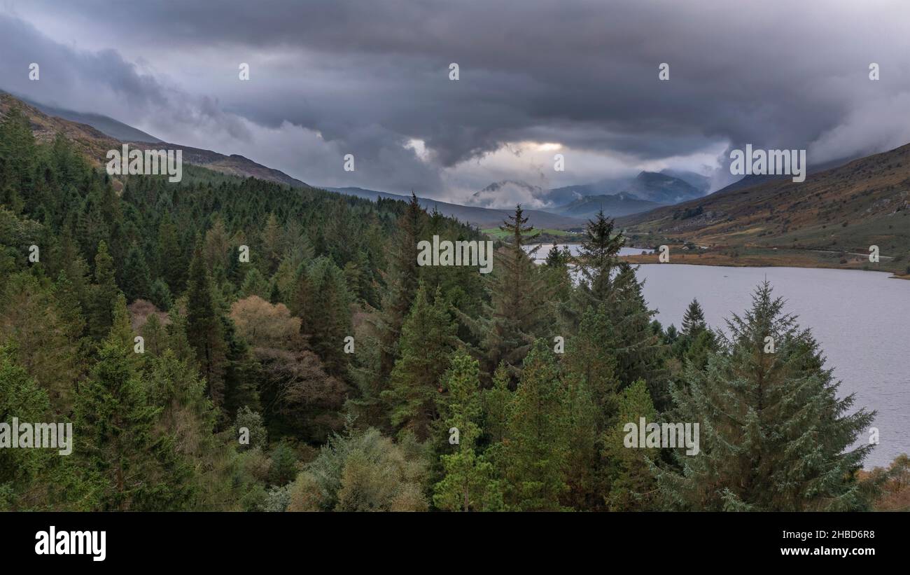 Epic aerial flying drone landscape image of Snowdon Massif viewed from ...