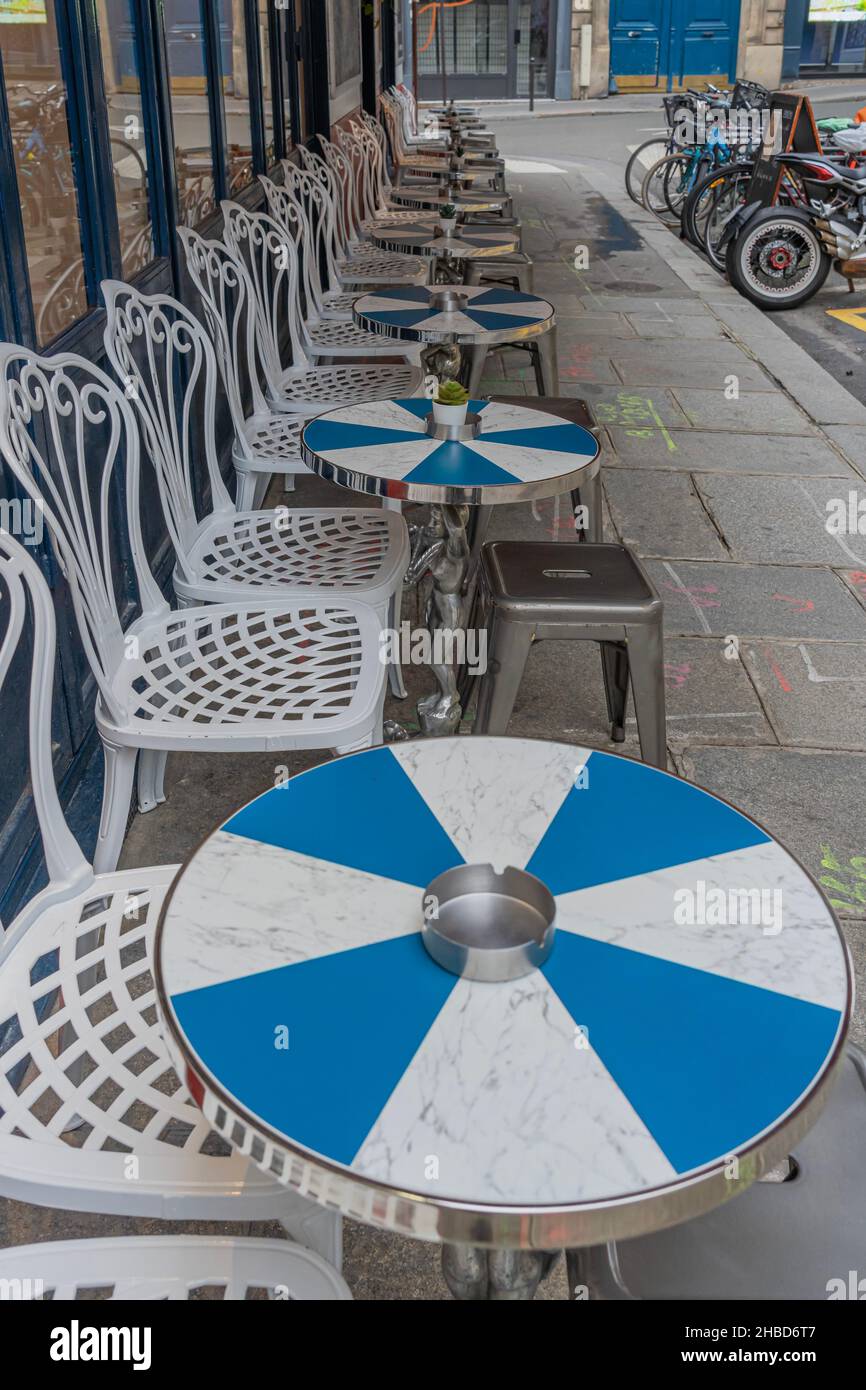 Paris, France - 11 15 2021: Typical bistro terrace table and chair ...