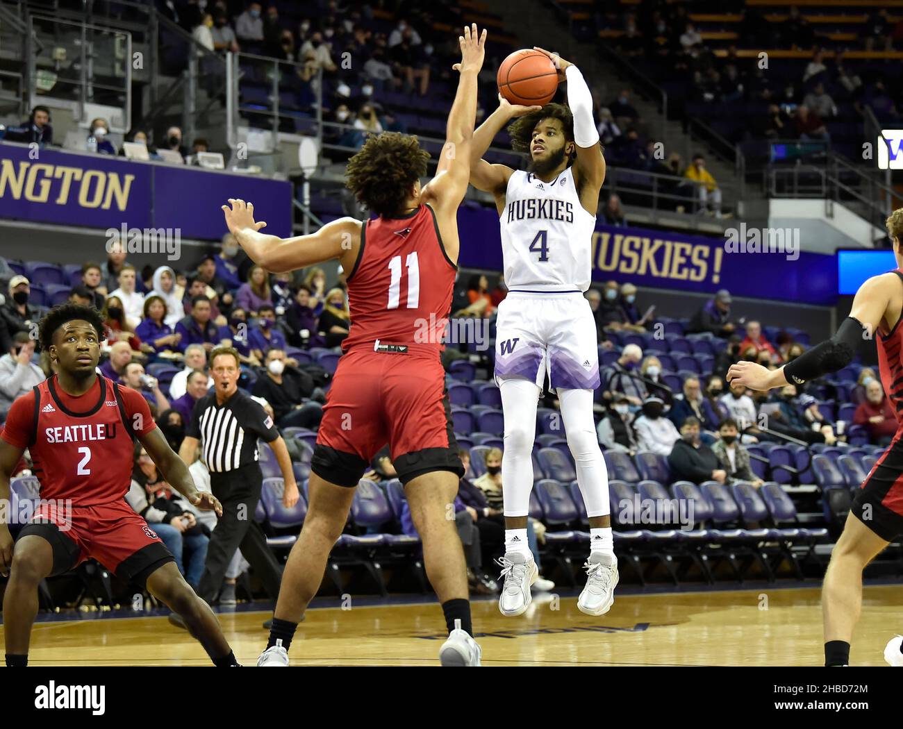 Seattle, WA, USA. 18th Dec, 2021. Washington G PJ Fuller elevates for a ...