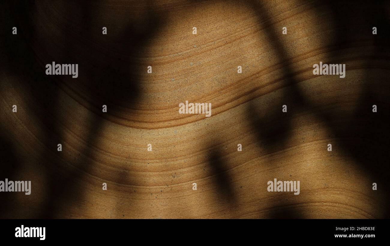 Curvy brown sand stone pattern with light and shade Stock Photo - Alamy