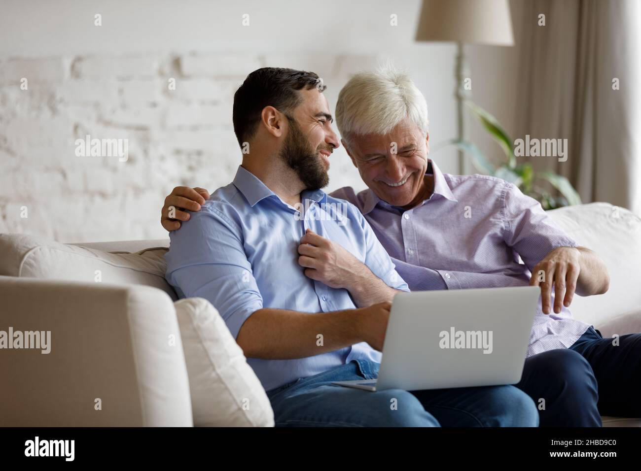 Two generations technology hi-res stock photography and images - Alamy