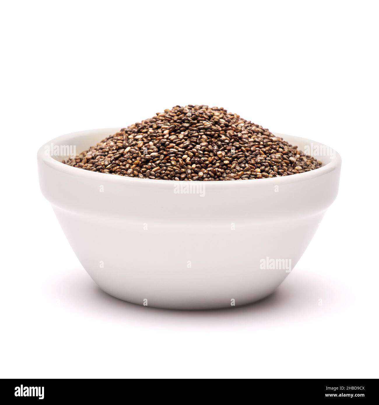 Ceramic bowl of organic natural chia seeds close-up isolated Stock ...