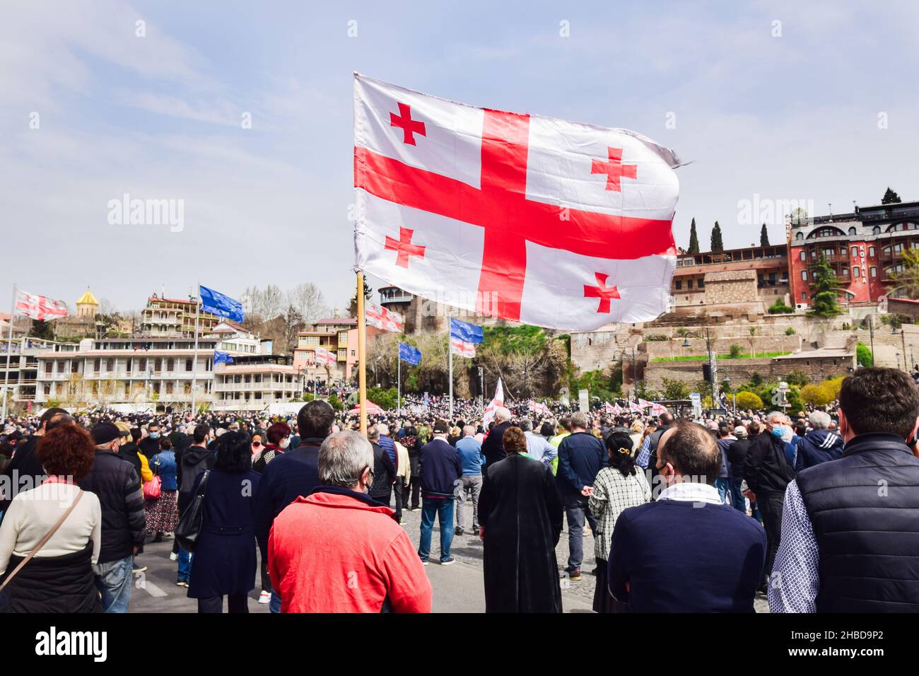 Tbilisi, Georgia - 9th april, 2021: Person holds georgian flag in ...