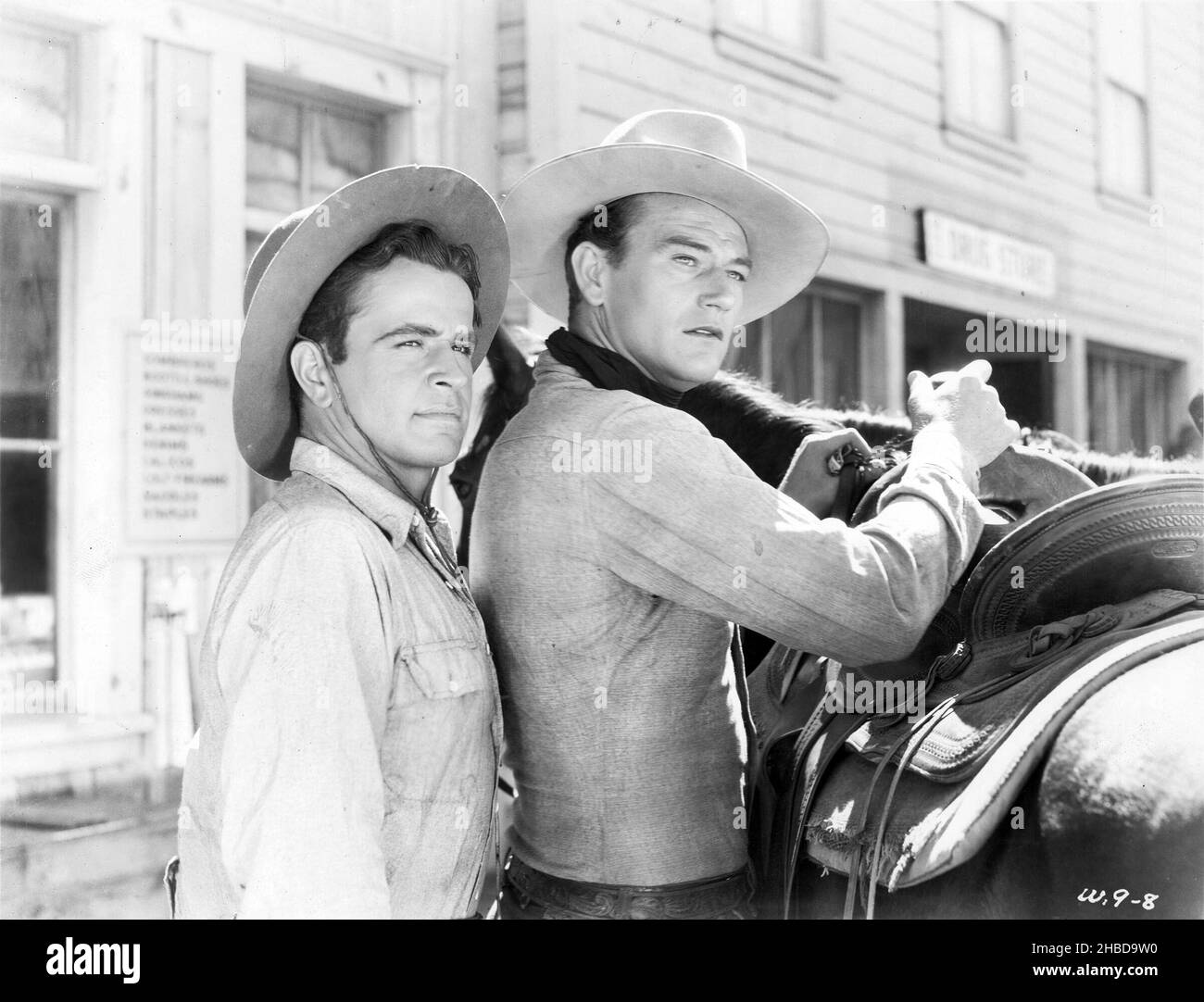 JOHN WAYNE and NOAH BEERY JR. in THE TRAIL BEYOND (1934), directed by ...