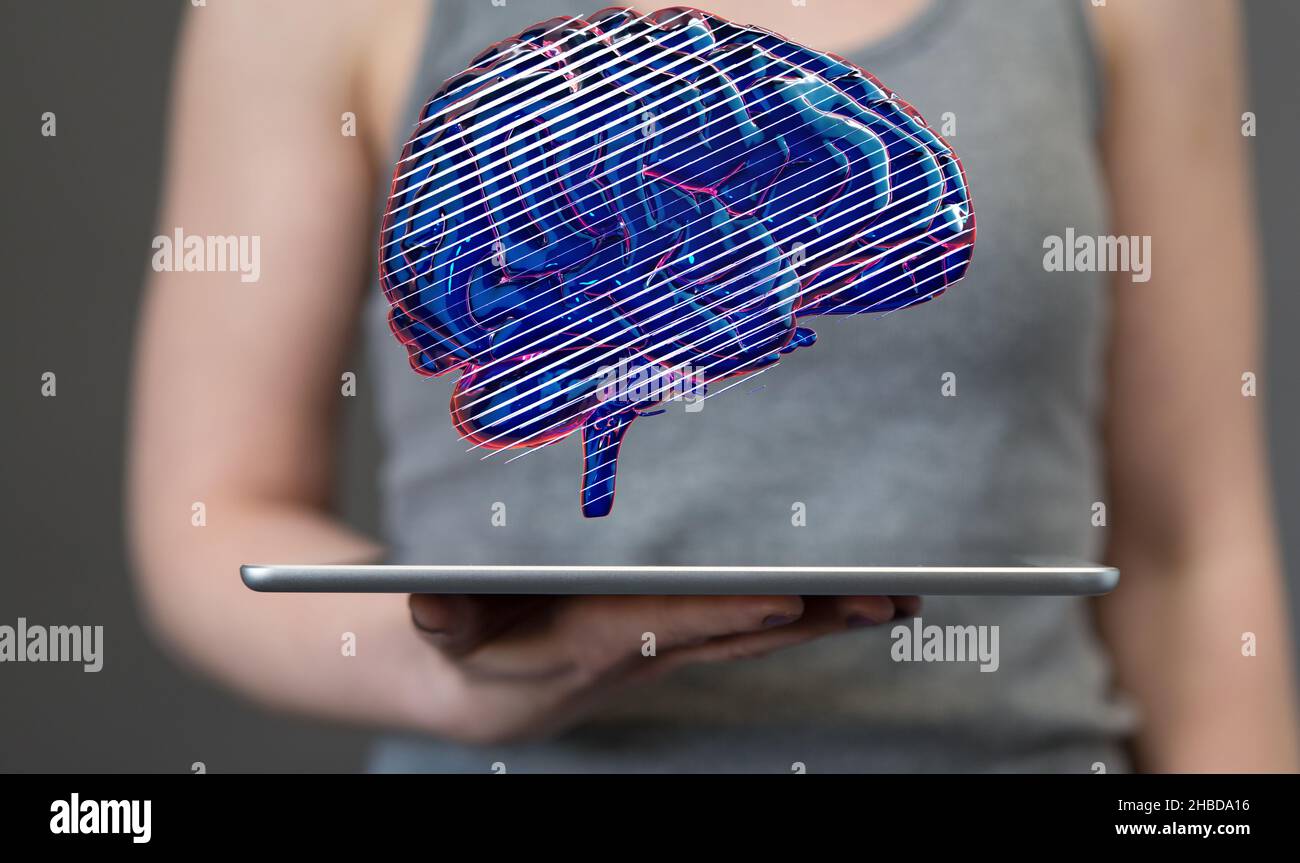 The 3D rendering of the human brain floating on the tablet held by a ...