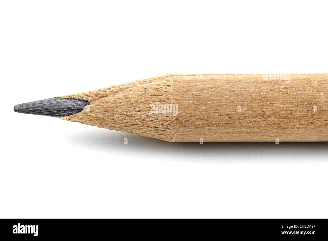 Macro photo of a sharpened pencil on a horizontal position, isolated on ...