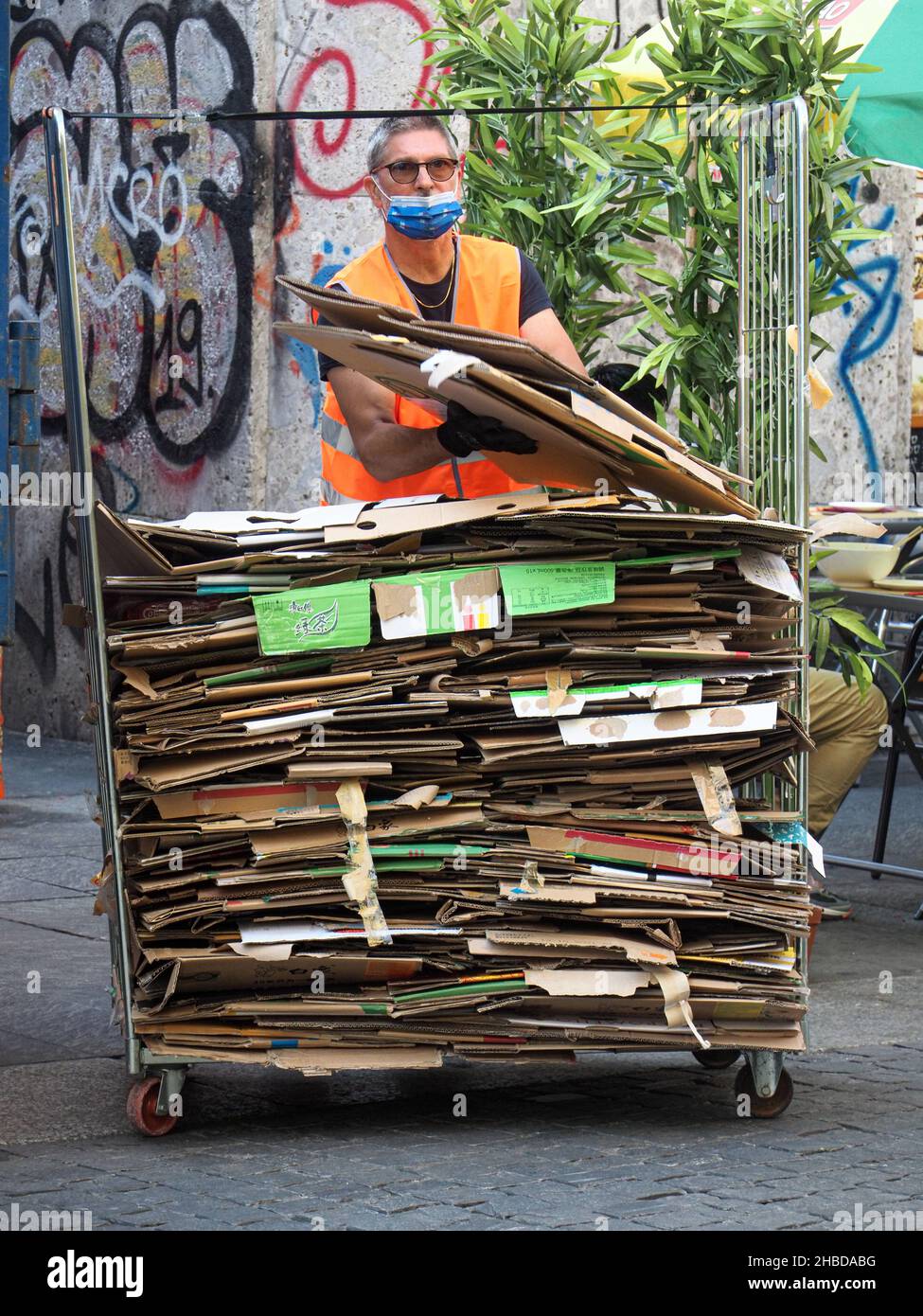 MILAN, ITALY - Sep 06, 2021: The management of cardboard boxes waste ...