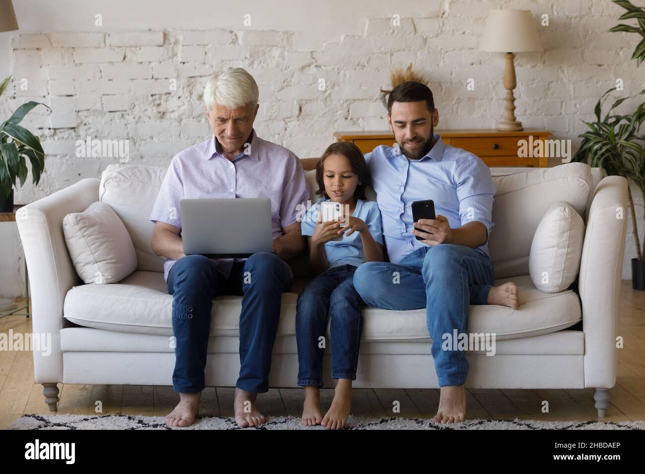 Technology gadgets family hi-res stock photography and images - Alamy