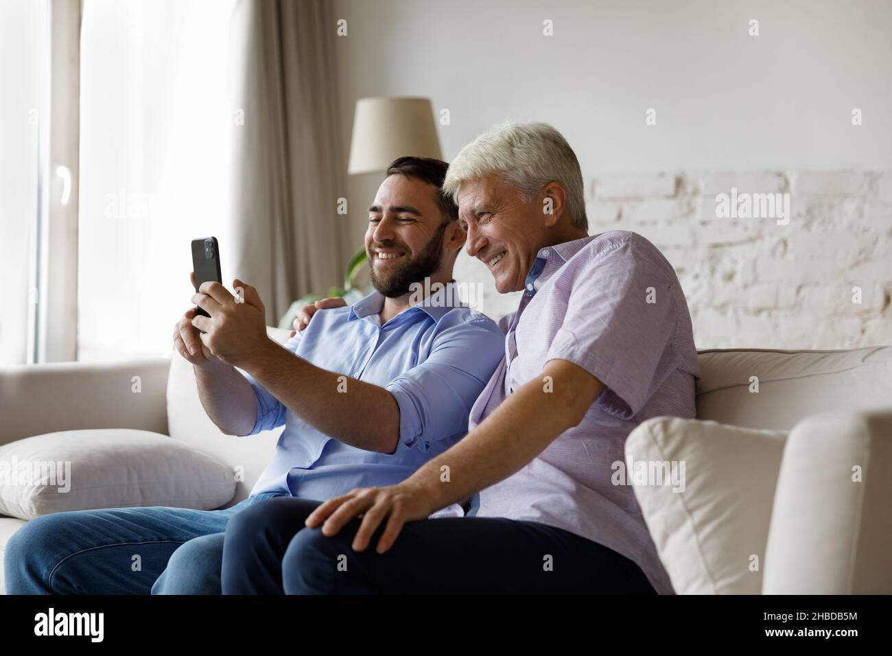 Two generations technology hi-res stock photography and images - Alamy