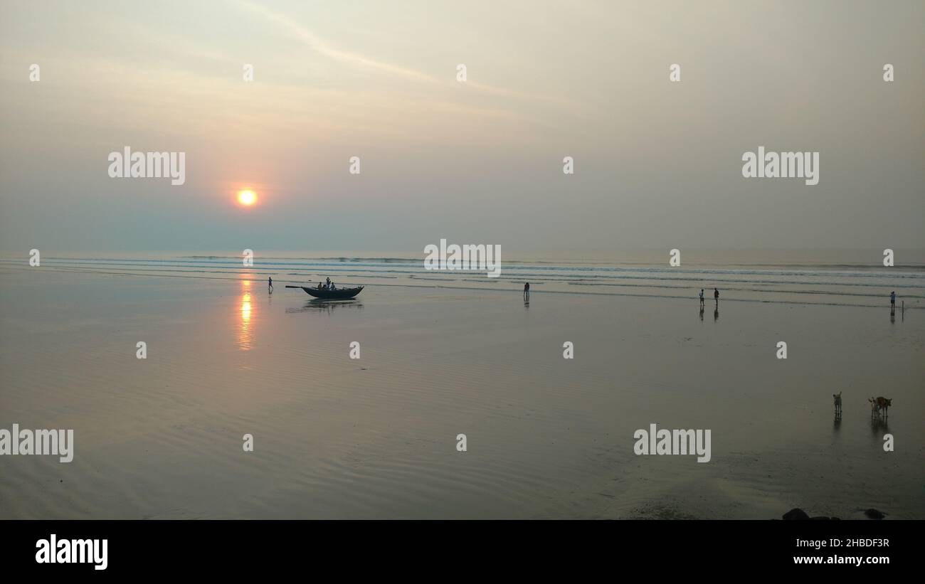 A beautiful scene of the Mandarmani beach captured at dawn before ...