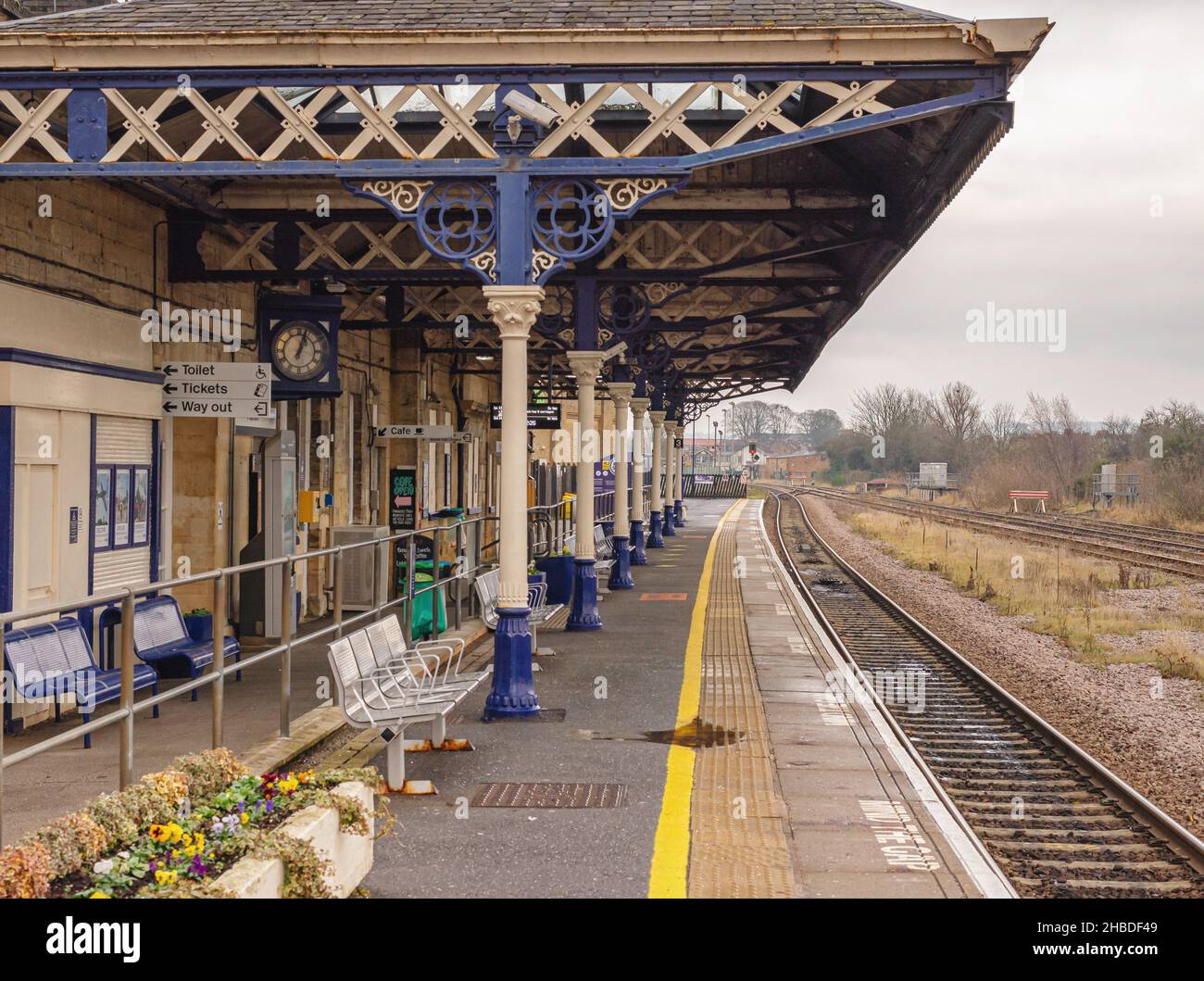 A small town and country railway station. There is an 18th century iron ...