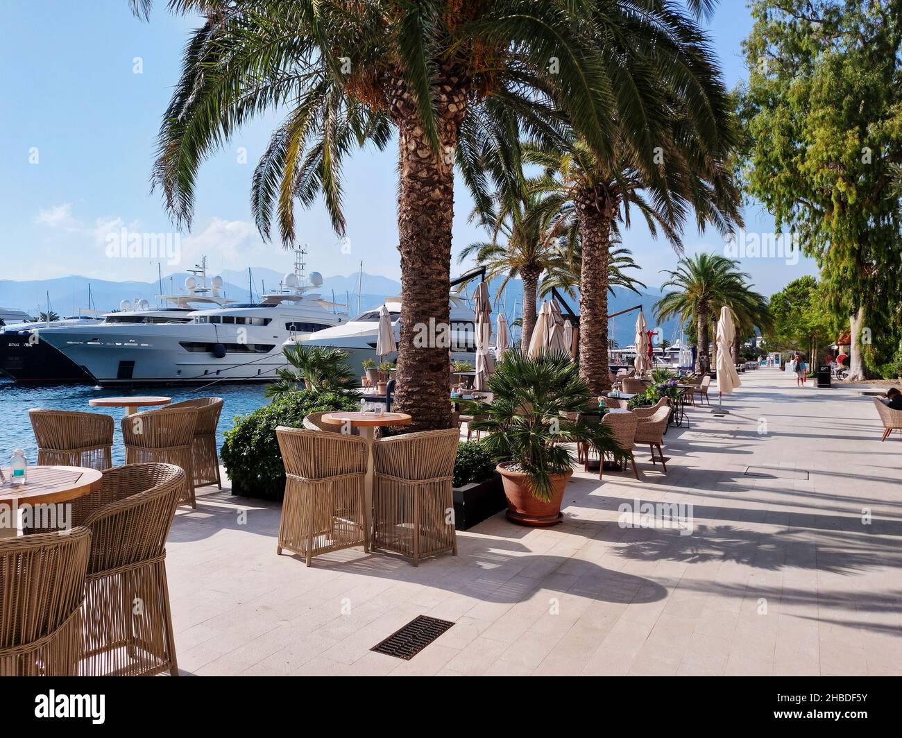 promenade street on seafront of Porto Montenegro, the famous port in ...