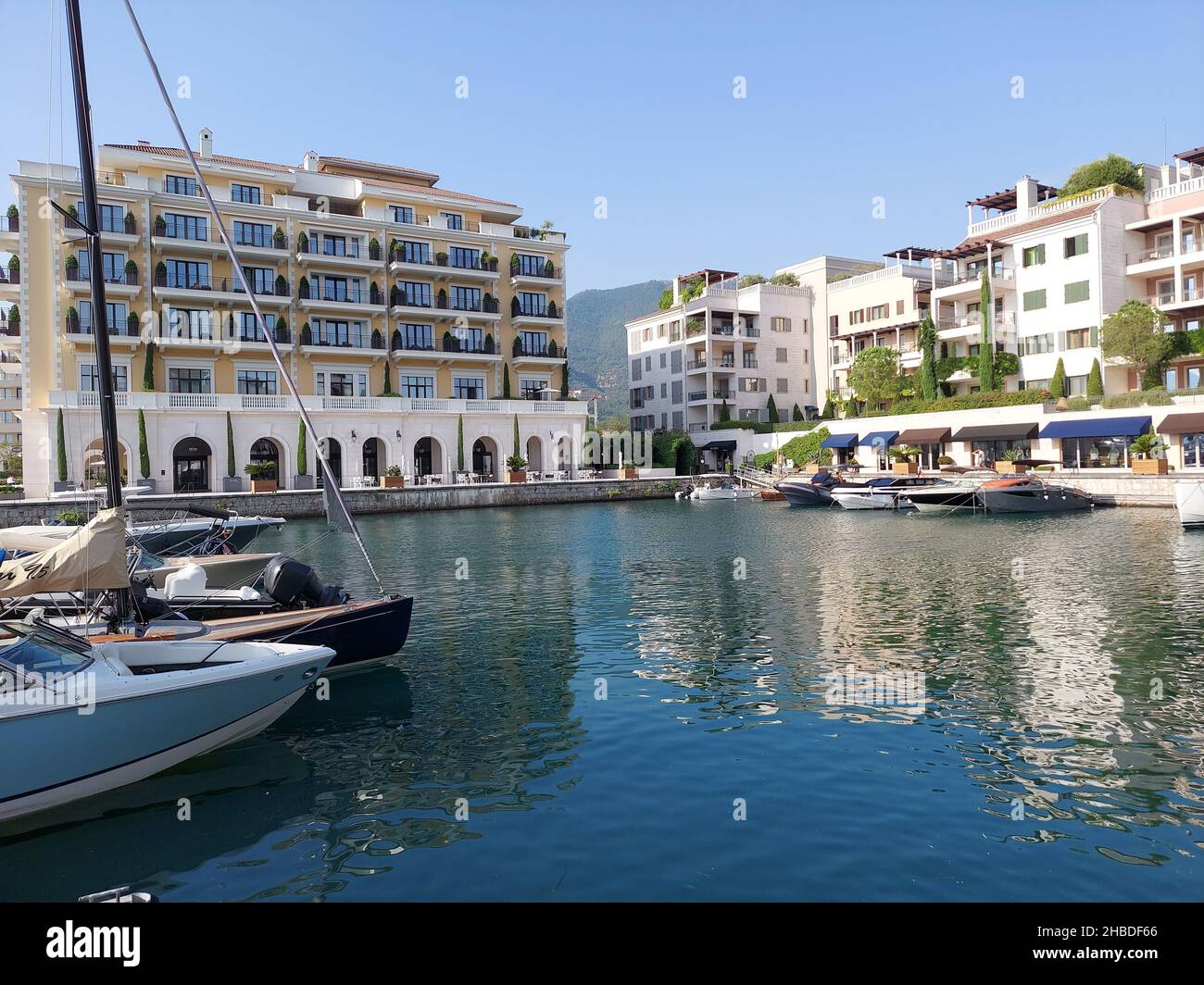 promenade street on seafront of Porto Montenegro, the famous port in ...