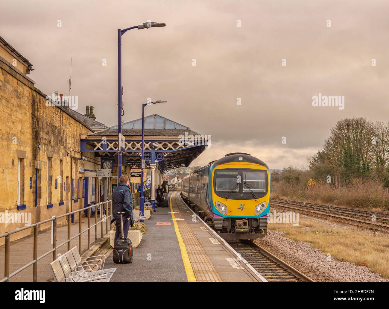 A small town and country railway station. There is an 18th century iron ...
