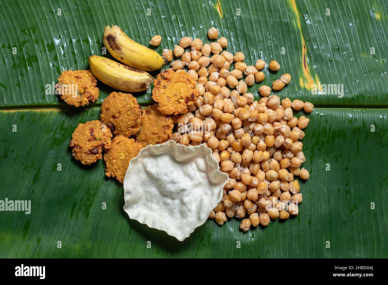 traditional dish served on banana leaf on Indian festival day. It is ...