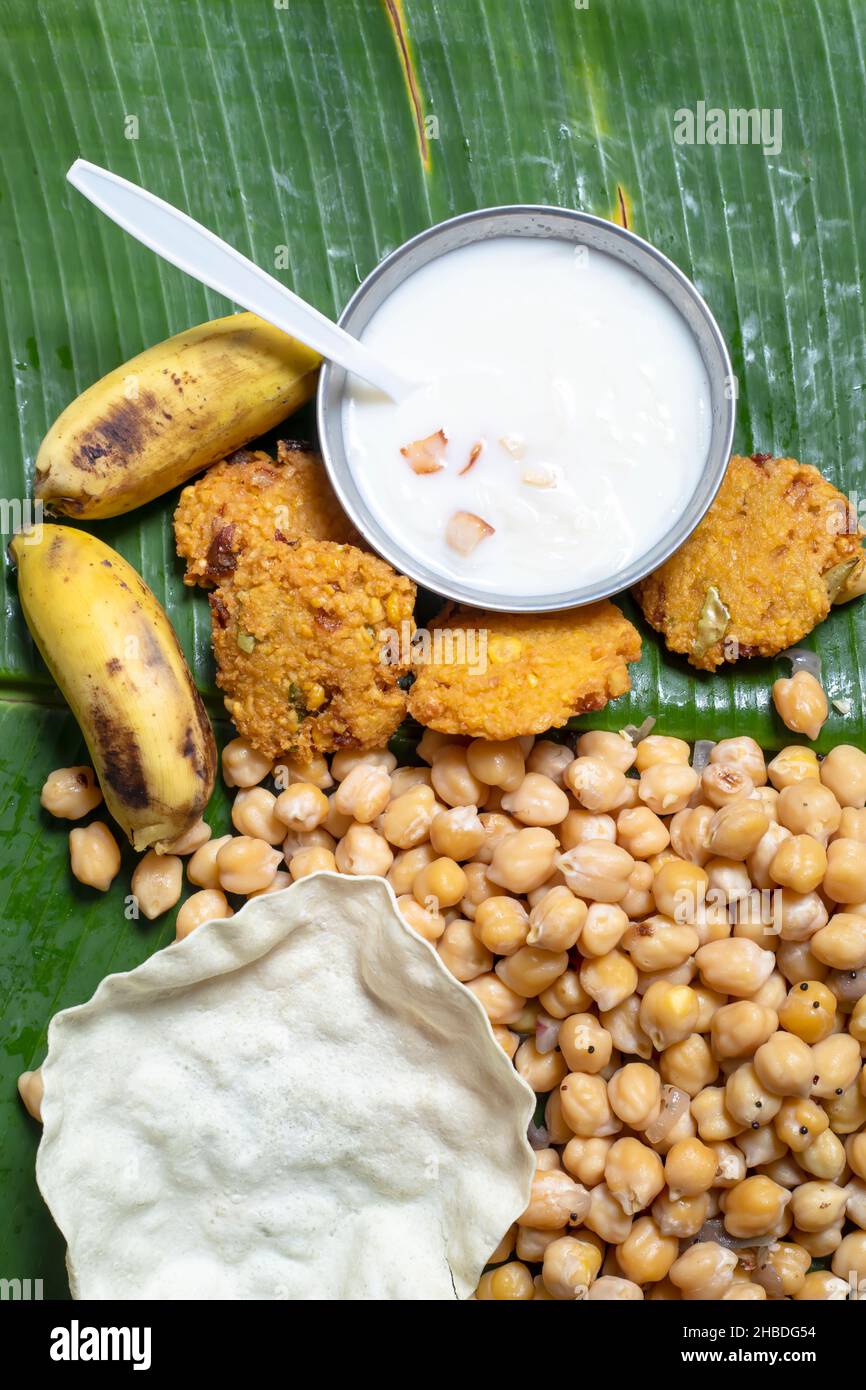 traditional South Asian (Indian) festivals banana leaf is served with ...