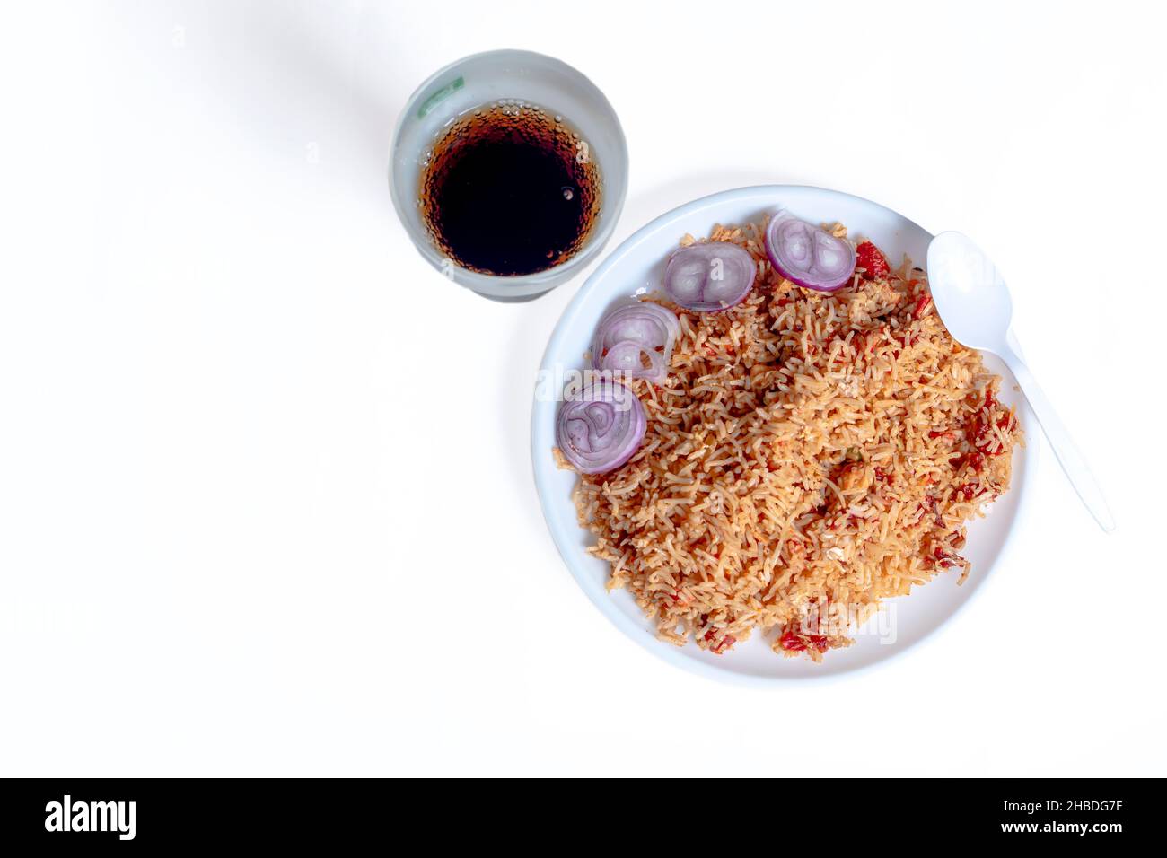 chicken rice and coke or pepsi (cool drink ) isolated on a white ...