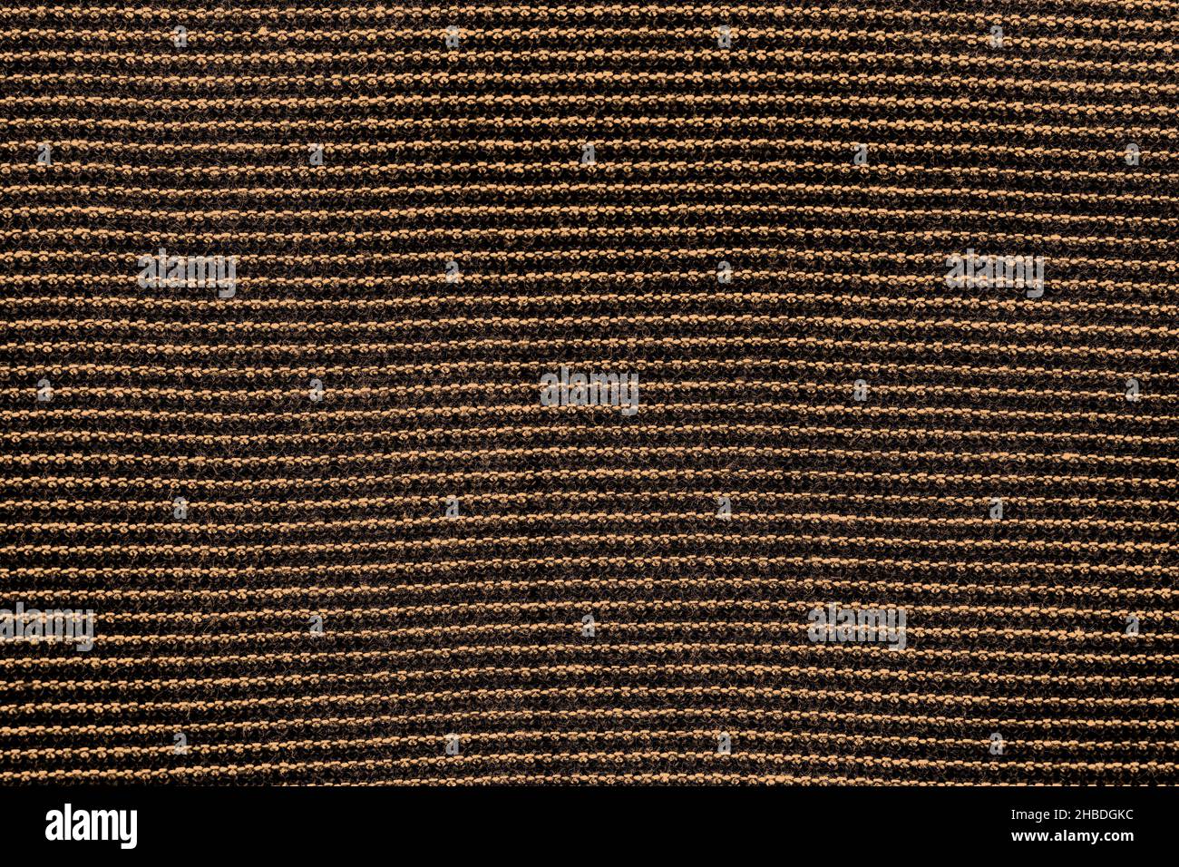 Golden color woolen fabric texture background with abstract pattern ...