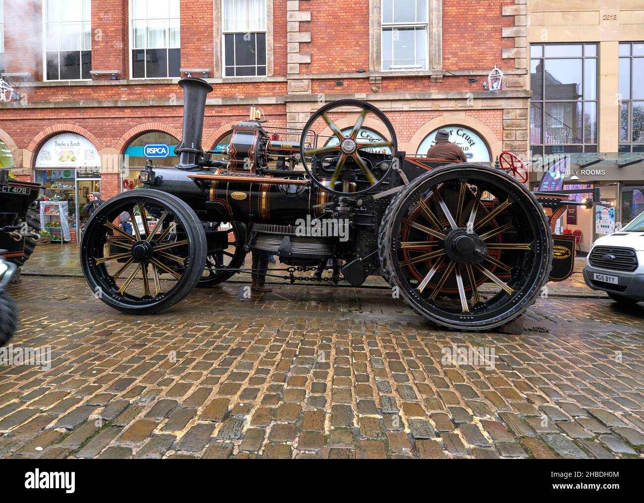 Restored vintage traction engine on display in a town center Stock ...
