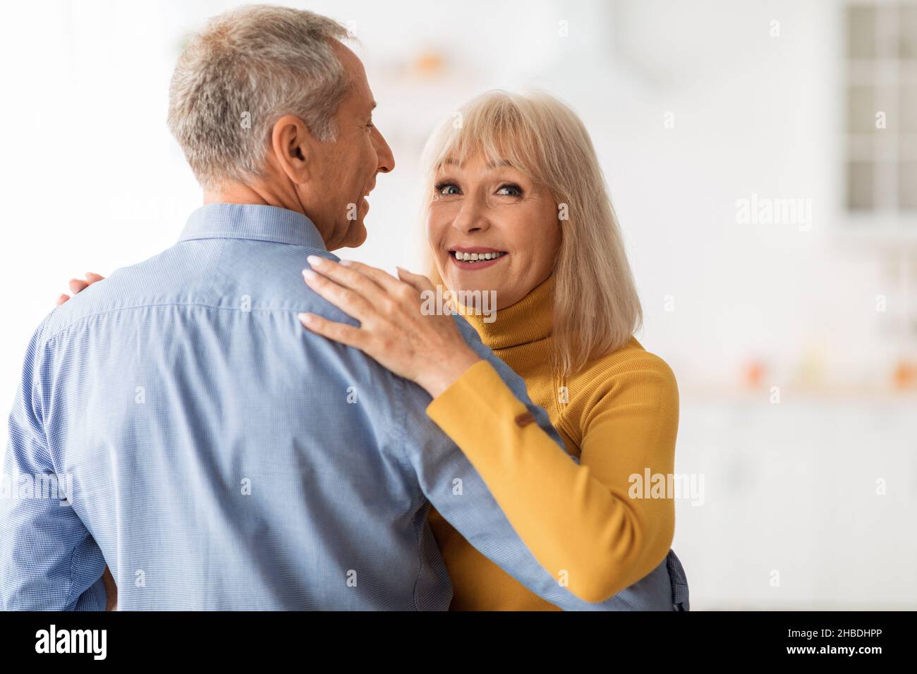 Cheerful Senior Spouses Dancing Slow Dance During Date At Home Stock ...