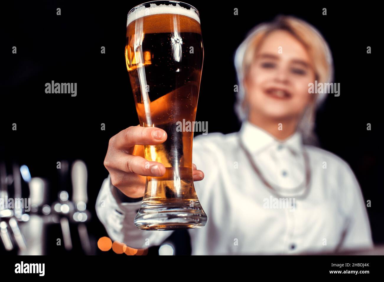 Hand bartender girl beer hi-res stock photography and images - Alamy