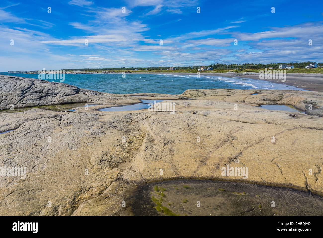 Rocky bay of Saint Lawrence Estuary in Riviere-au-Tonnerre, a small ...