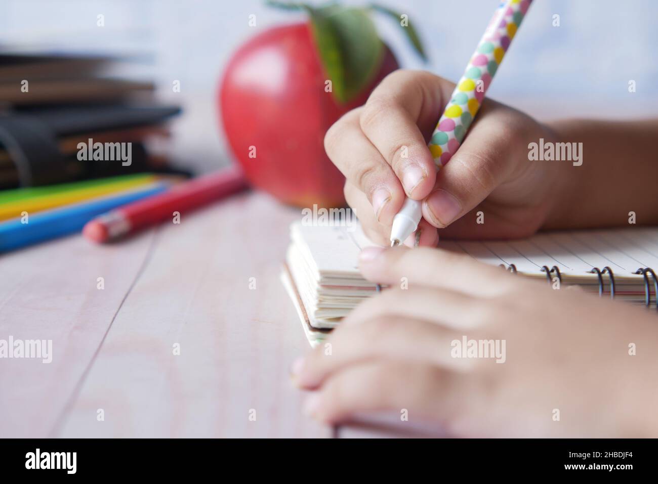 Child hand writing hi-res stock photography and images - Alamy