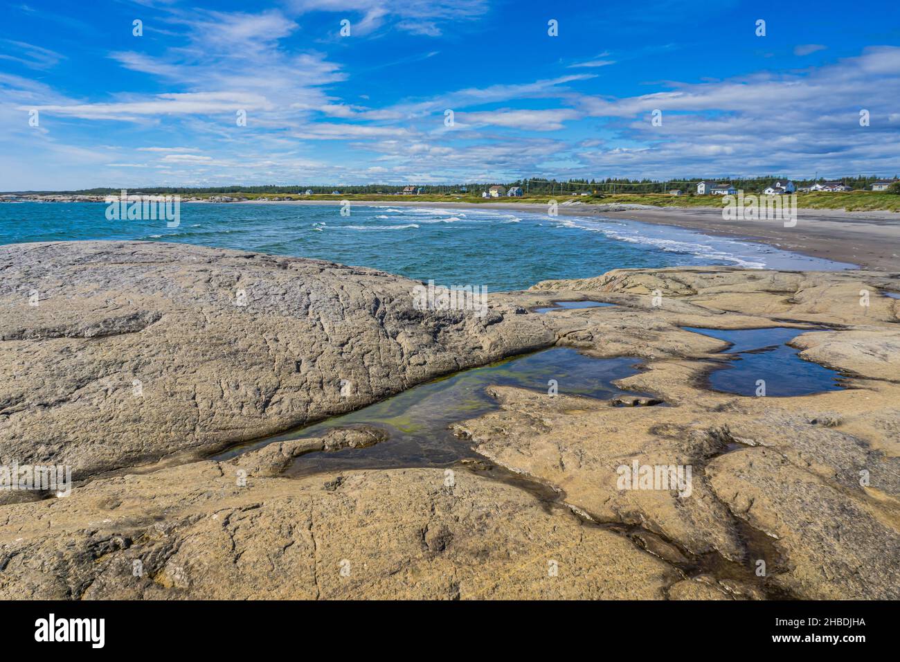 Rocky bay of Saint Lawrence Estuary in Riviere-au-Tonnerre, a small ...