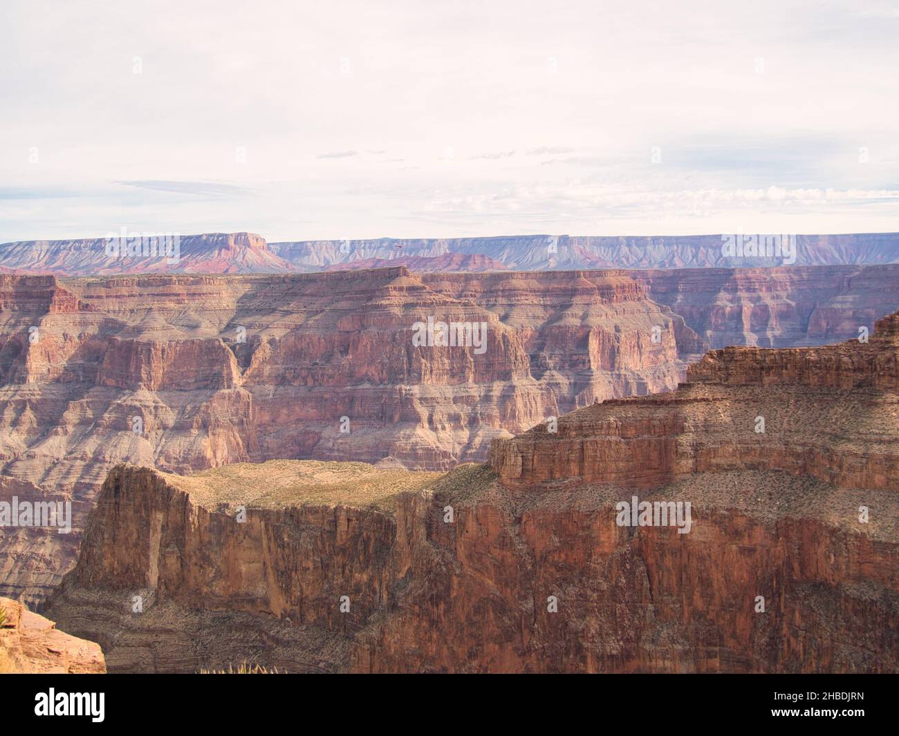 A landscape of Eagle Point at Grand Canyon under a cloudy sky in ...