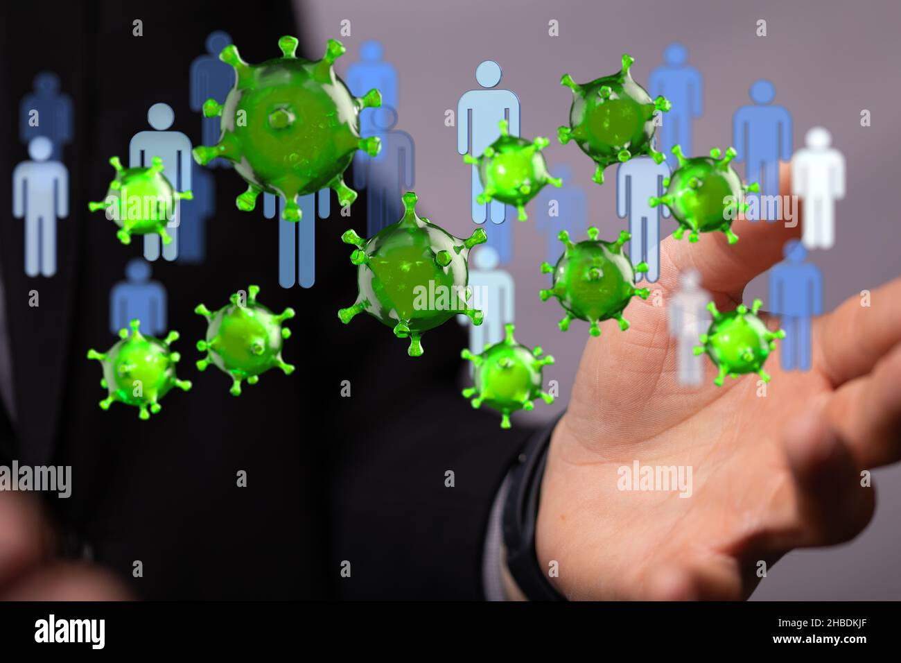 A 3D rendering of virus particles with human figures on a person's hand ...