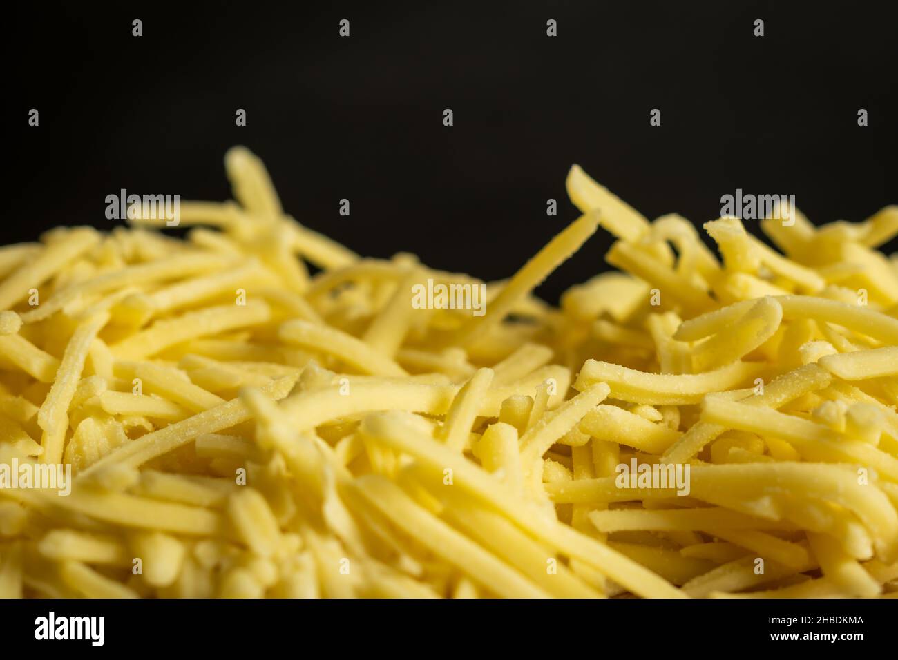 Organic raw shredded cheddar hi-res stock photography and images - Alamy